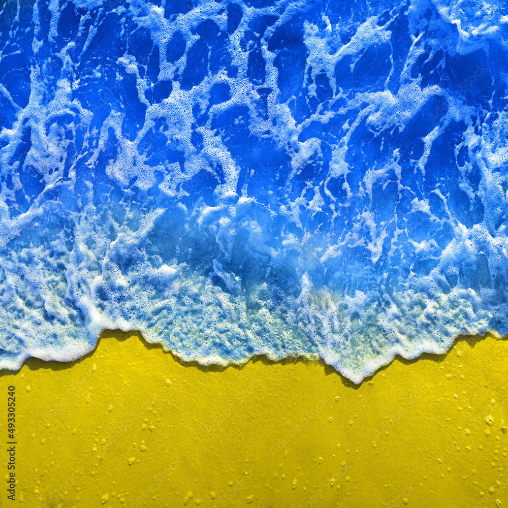 sea wave and sand as a symbol of ukraine, ukrainian flag Stock Photo ...