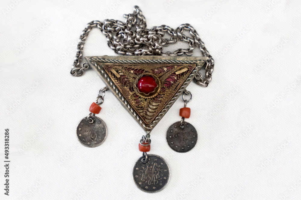 Ankara, Turkey- March 03 2022: Old and worn metal muska cover. Muska an ...