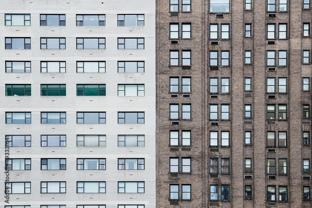 the contrast of a light building and a dark one Stock Photo | Adobe Stock