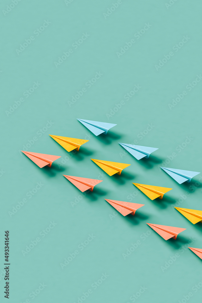 Colorful paper planes in rows following a direction Stock Photo | Adobe ...