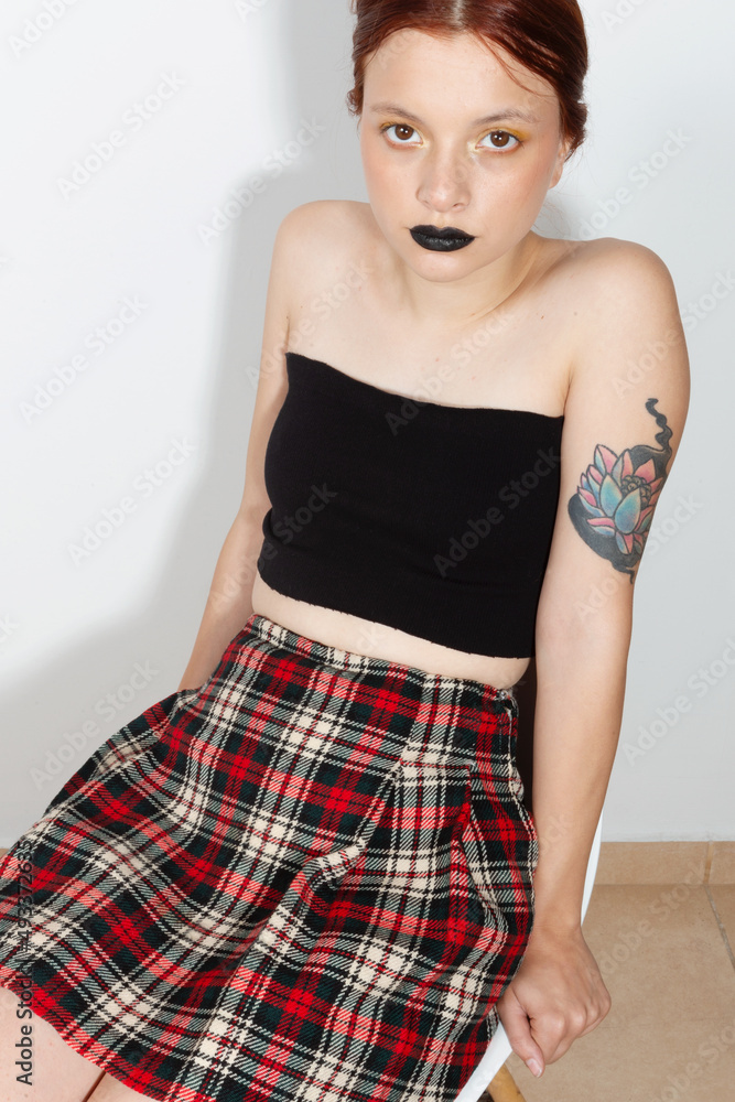 Full length standing pose on a studio background. Stock Photo | Adobe Stock