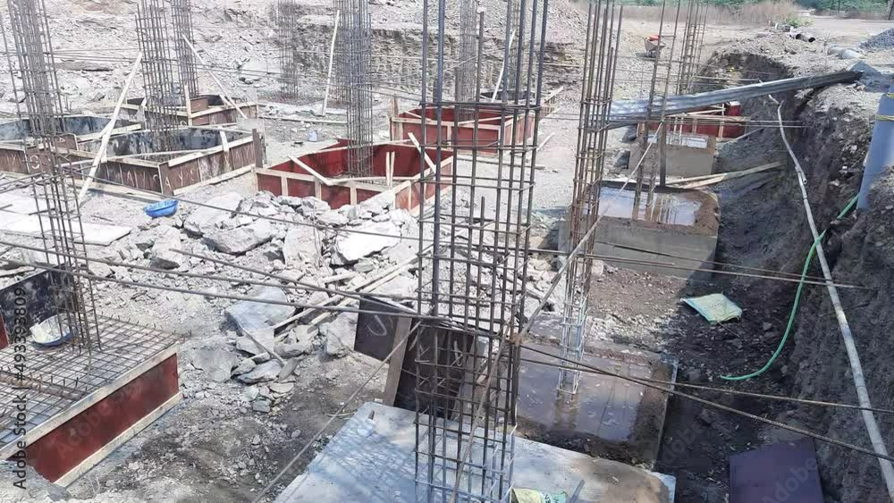 Pile cap and column stump under construction at the construction site ...