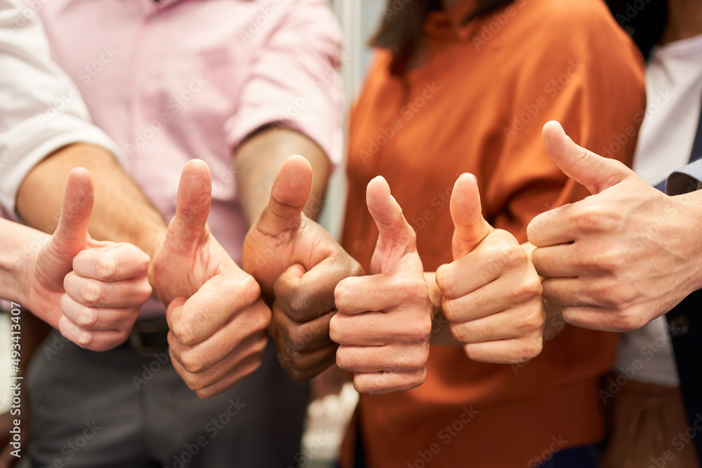 Business start-up team showing thumbs up Stock Photo | Adobe Stock