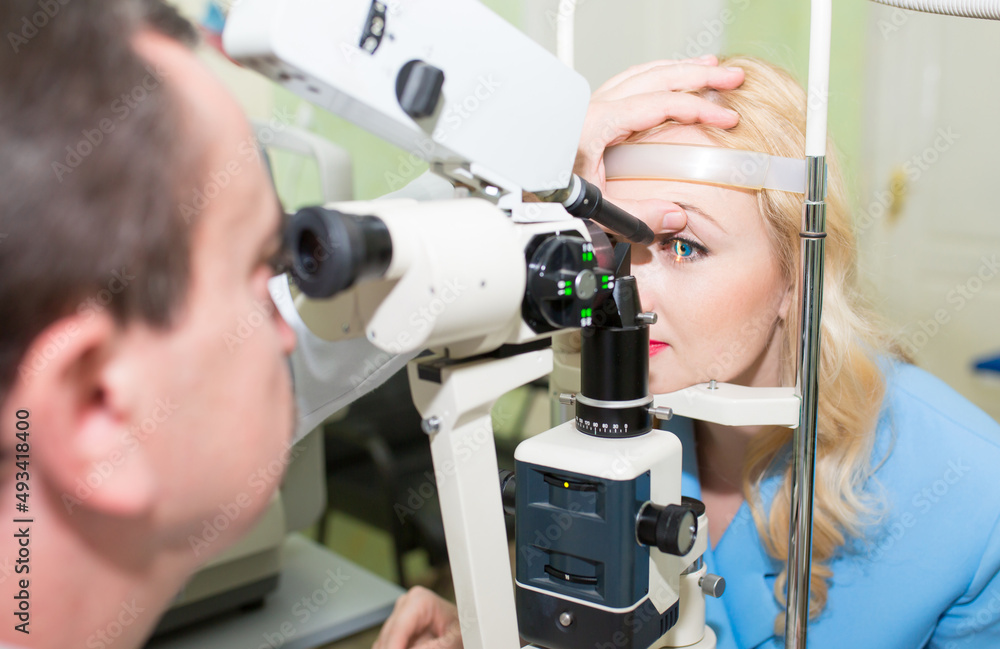 The patient passes an ophthalmologic examination, the doctor checks the ...