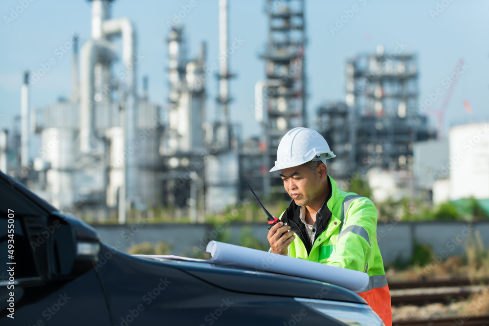 Refinery industry engineer wearing PPE Working at refinery construction ...