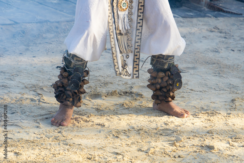 The legs of a man performing a traditional dance, in the national ...