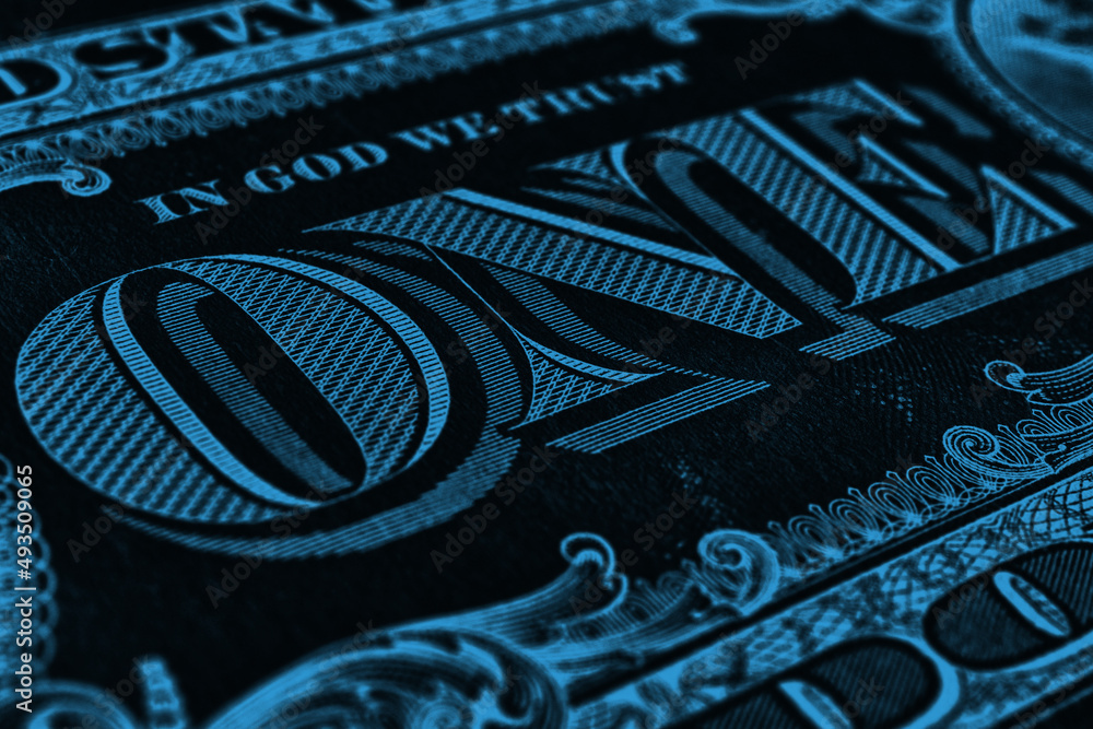 American paper money. 1 US dollar bill. Word one close-up. Dark blue ...