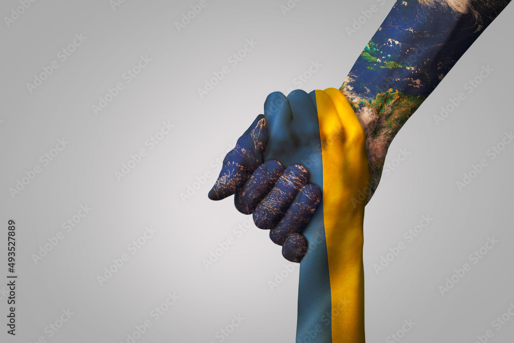 world help and support to Ukraine concept. giving a helping hand to ...