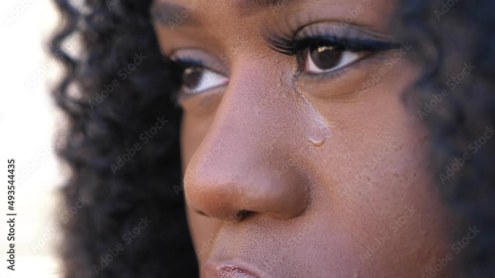 Profile of a sad african-american woman crying: upset depressed black ...