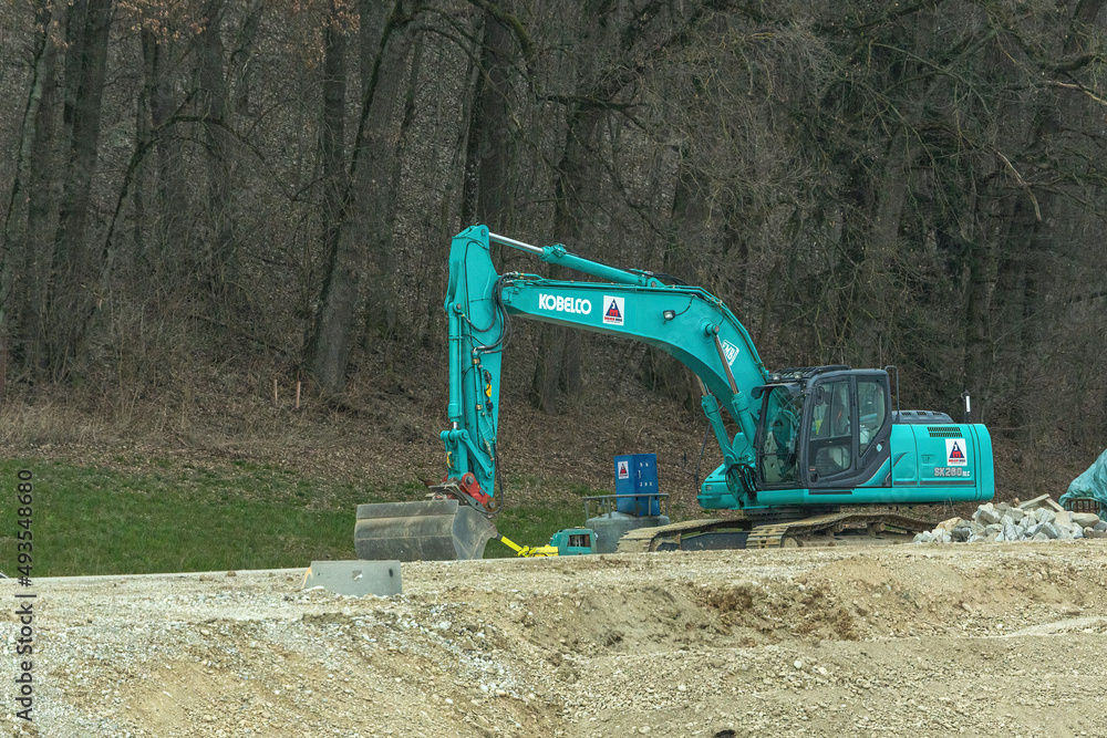 Pocking, Bavaria, Germany, 2022, March 6th: A Kobelco bagger on a ...