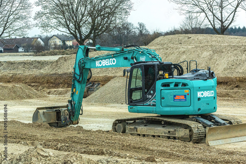 Pocking, Bavaria, Germany, 2022, March 6th: A Kobelco bagger on a ...