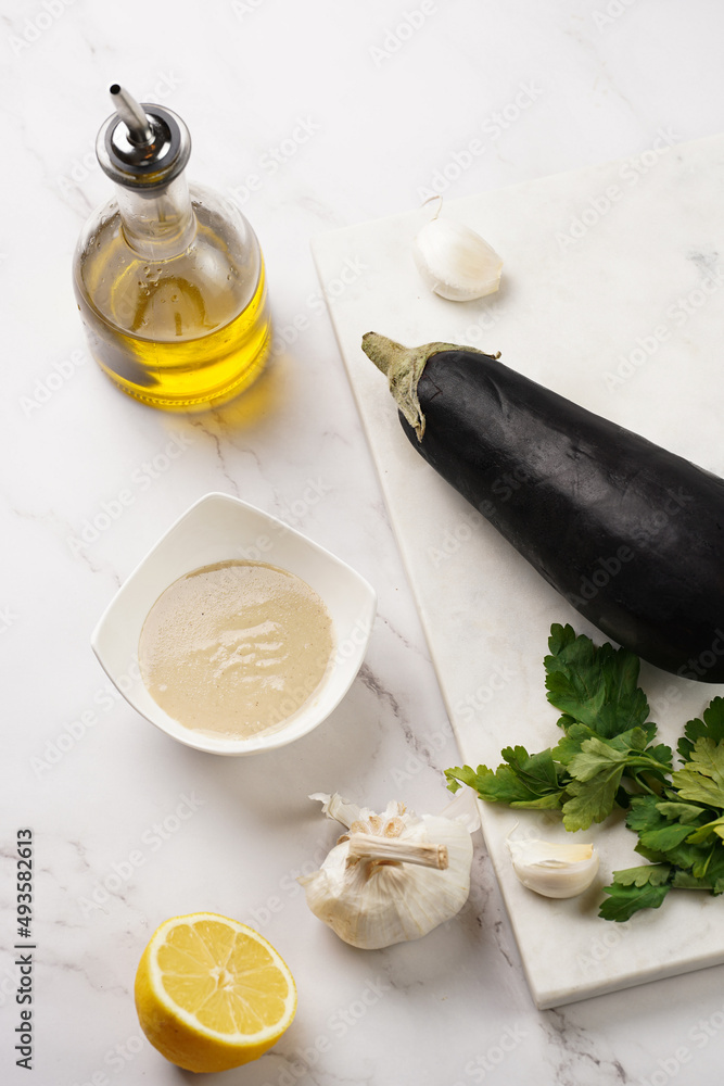 Ingredients for a traditional dish of arabic cuisine baba ganoush ...