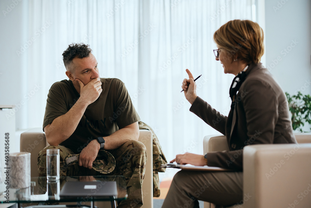 Military officer having counseling with mental health professional ...