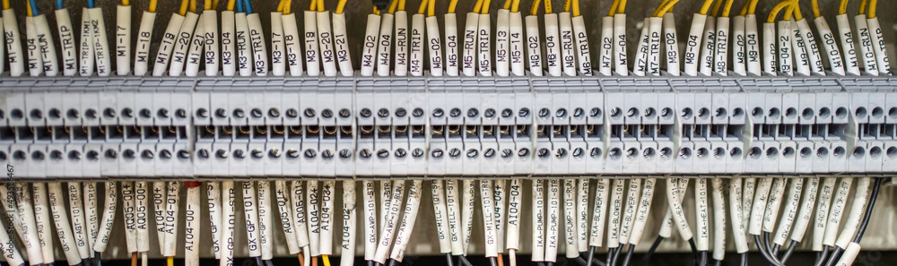 Control panel with circuit breakers, fuses, rails, wiring in the ...