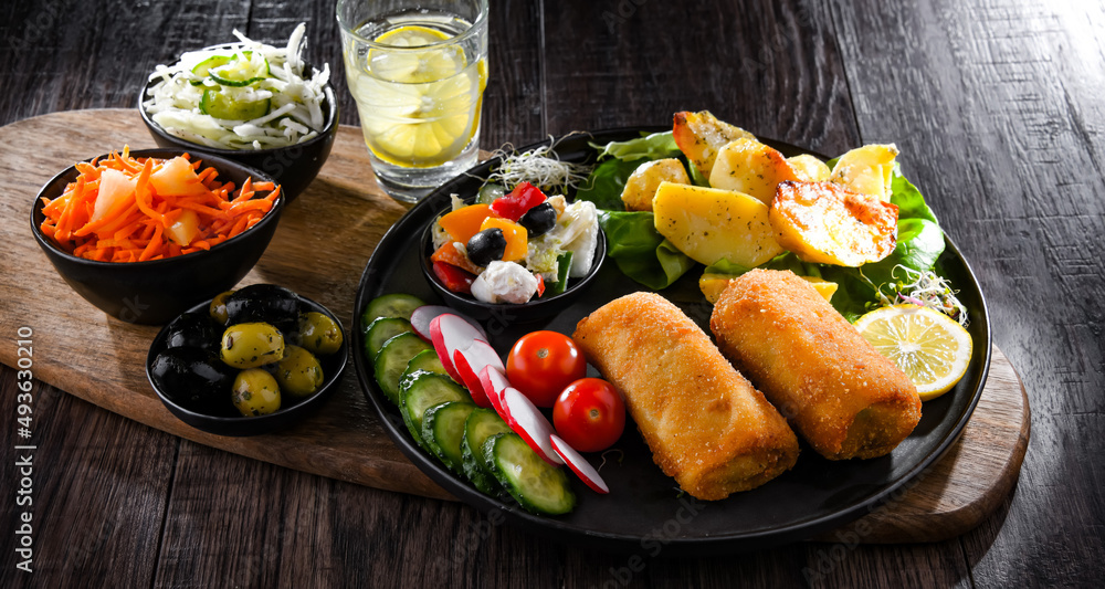 Breaded and deep-fried croquettes with potatoes and vegetables Stock ...