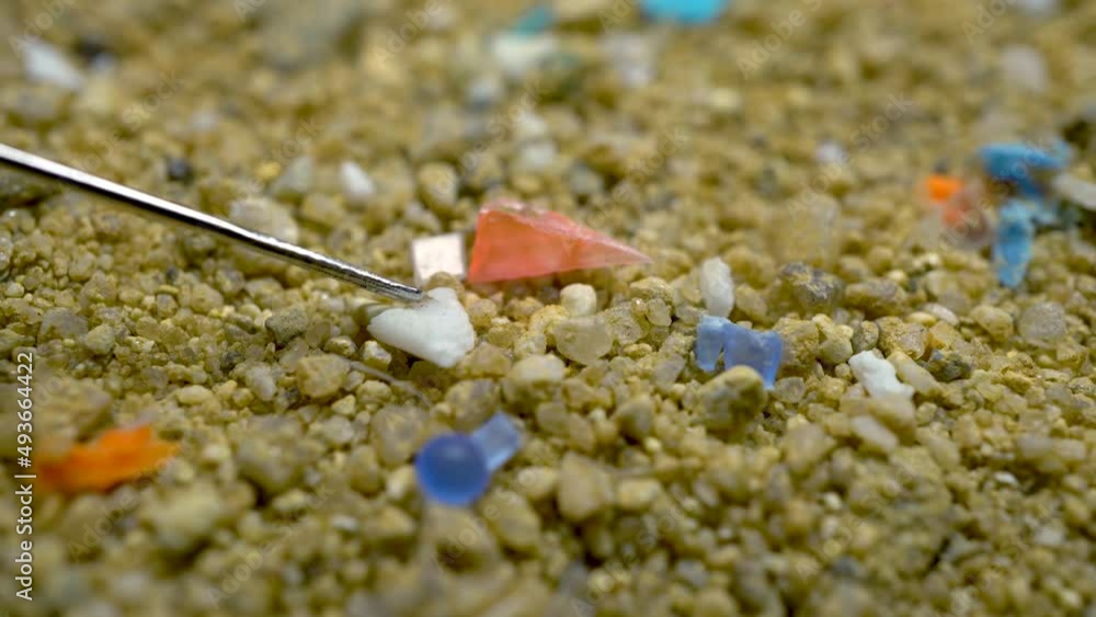 Vidéo Stock Microplastics in the sand on the beach. Concept of global ...