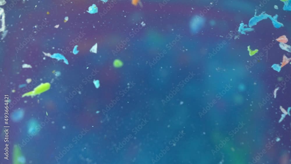 Microplastics in polluted water. Concept of global warming and climate ...