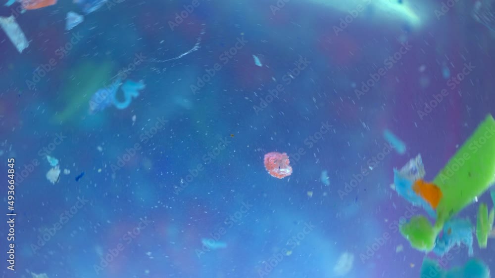 Microplastics in polluted water. Concept of global warming and climate ...