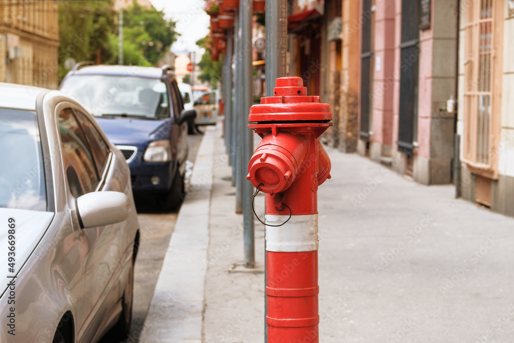 Red fire hydrant in city street. Fire hidrant for emergency fire access ...