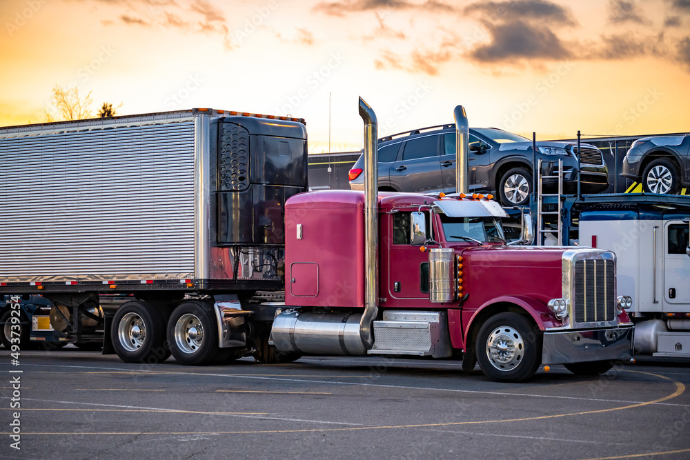 Magenta classic big rig American semi truck with low profile extended ...
