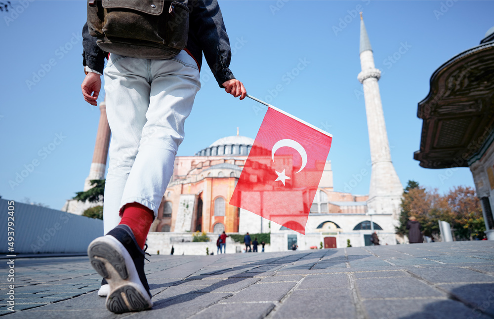 Enjoying vacation in Istanbul. Tourist with national turkish flag ...