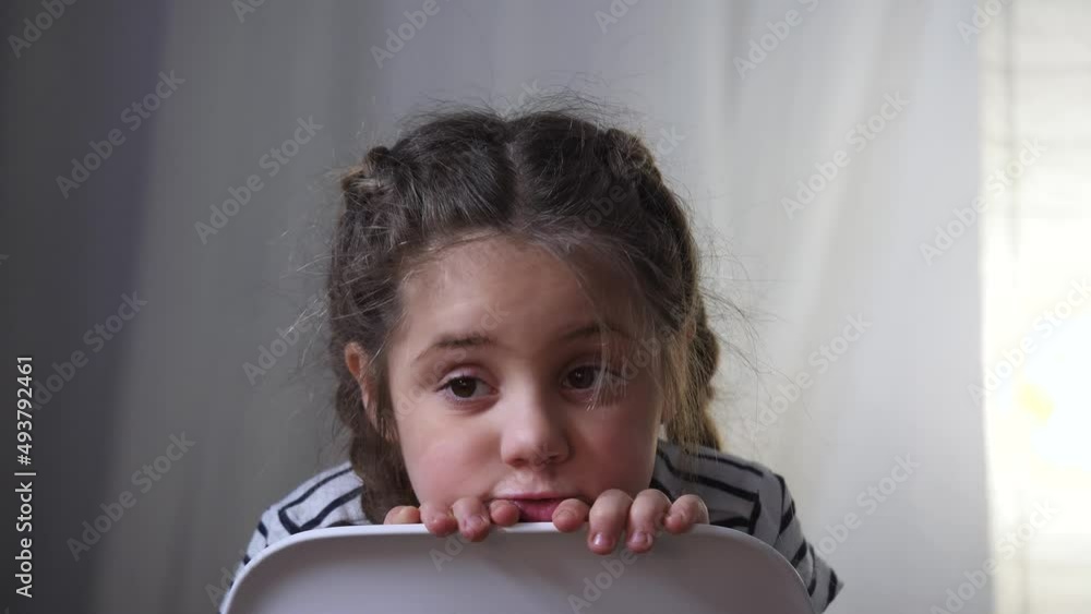 Sad little girl. Loneliness of child. Denial of domestic violence. Sad ...