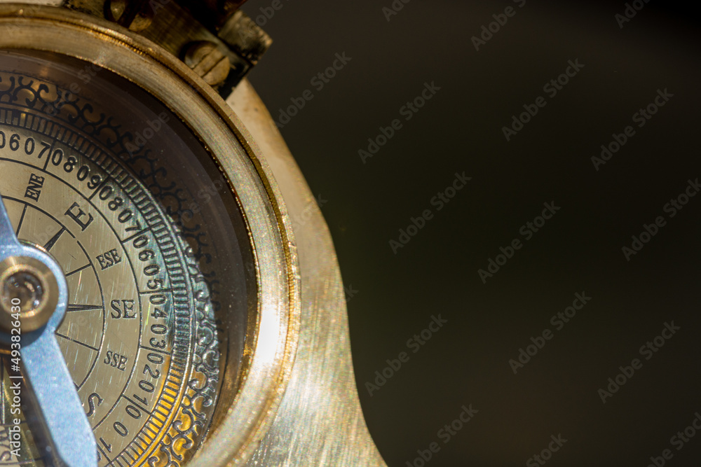 Detail of an antique maritime bronze solar compass Stock Photo | Adobe ...
