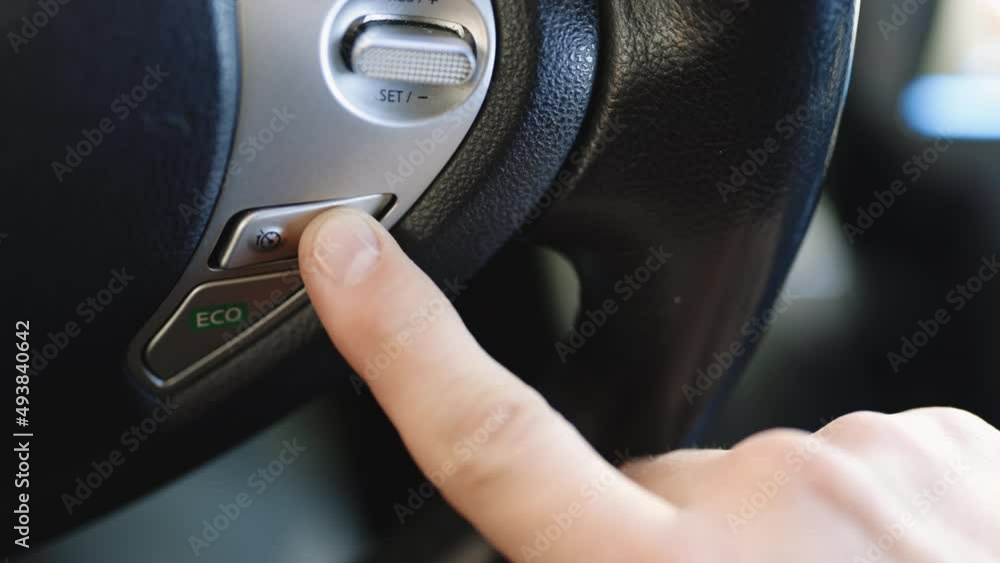 Businessman finger press the button to start the autonomous cruise ...