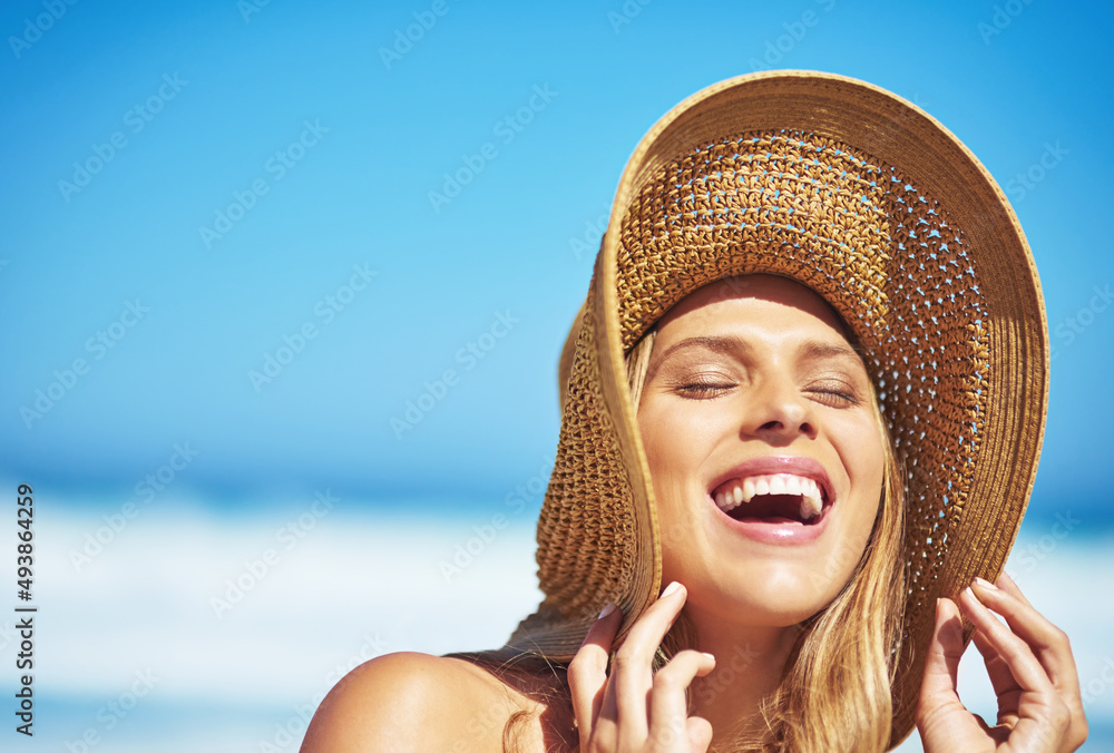 Discover the wonder of summer. Shot of a gorgeous young woman in a ...
