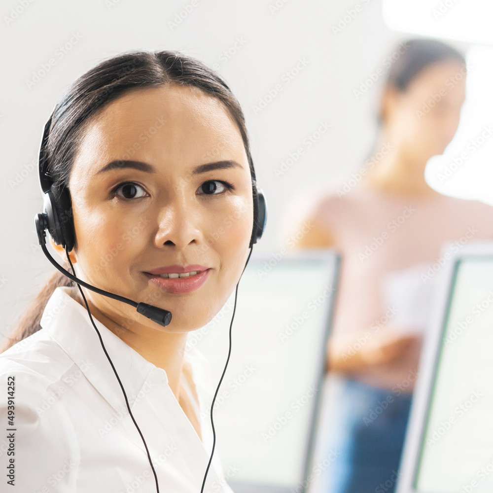 Foto de Team of professional support staff working in the office. Colleagues in the workplace ...
