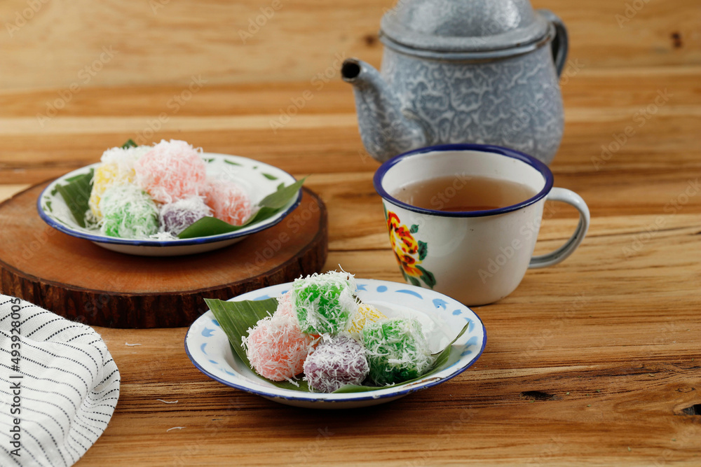 Sentiling, Steamed Grated Cassava with Food Coloring, Coated with ...