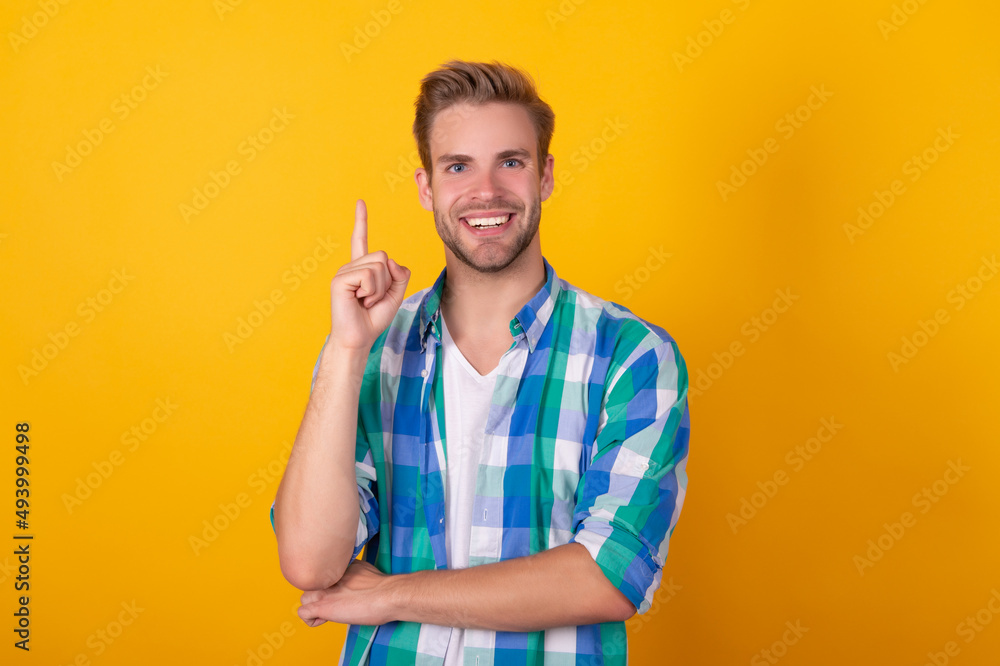 Trust your crazy idea. Happy man keep raised finger. Genius guy make ...