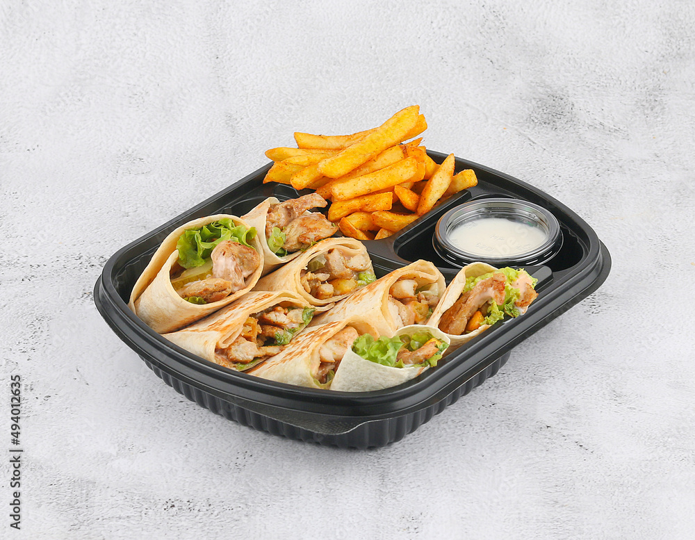 Arabic shawarma plate with appetizers and sauce Stock Photo | Adobe Stock