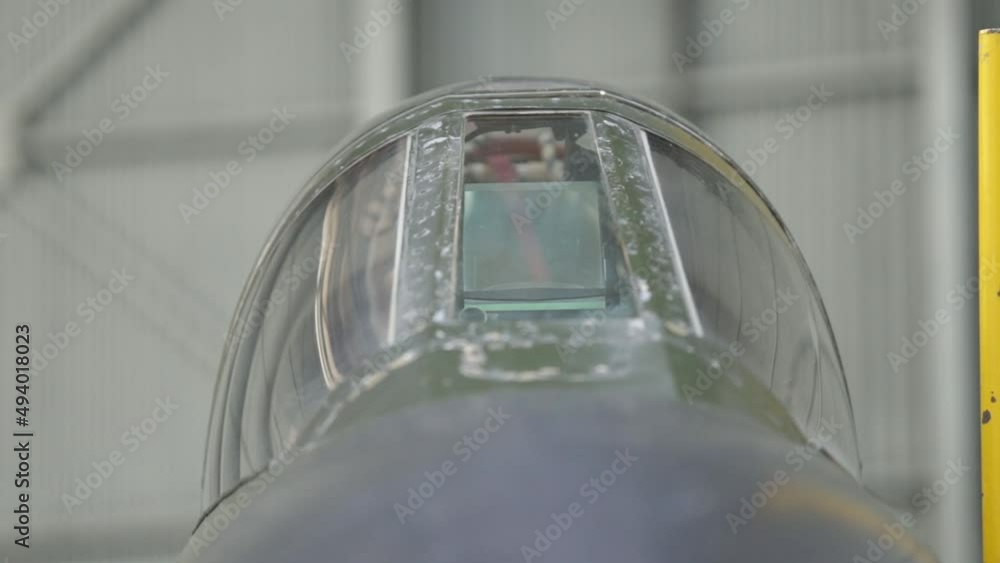 Air Force Jet Fighter in Hangar, Red Ribbon on Jet Fighter Pitot Tube ...