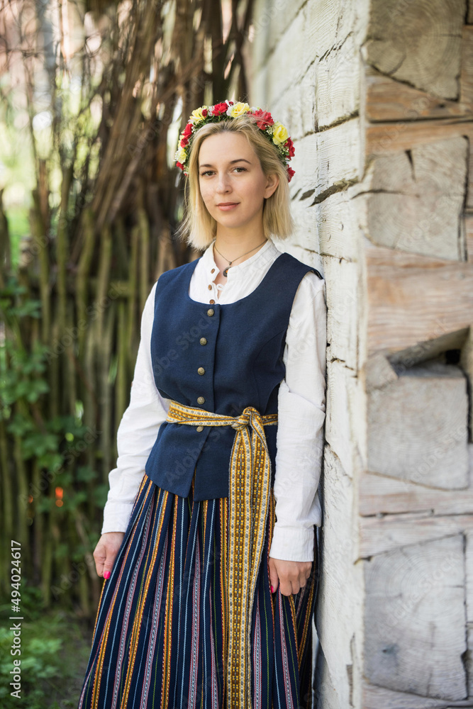 Woman in traditional clothing posing on nature in village. Stock Photo ...
