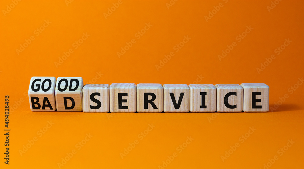 Good or bad service symbol. Turned wooden cubes and changed words bad ...
