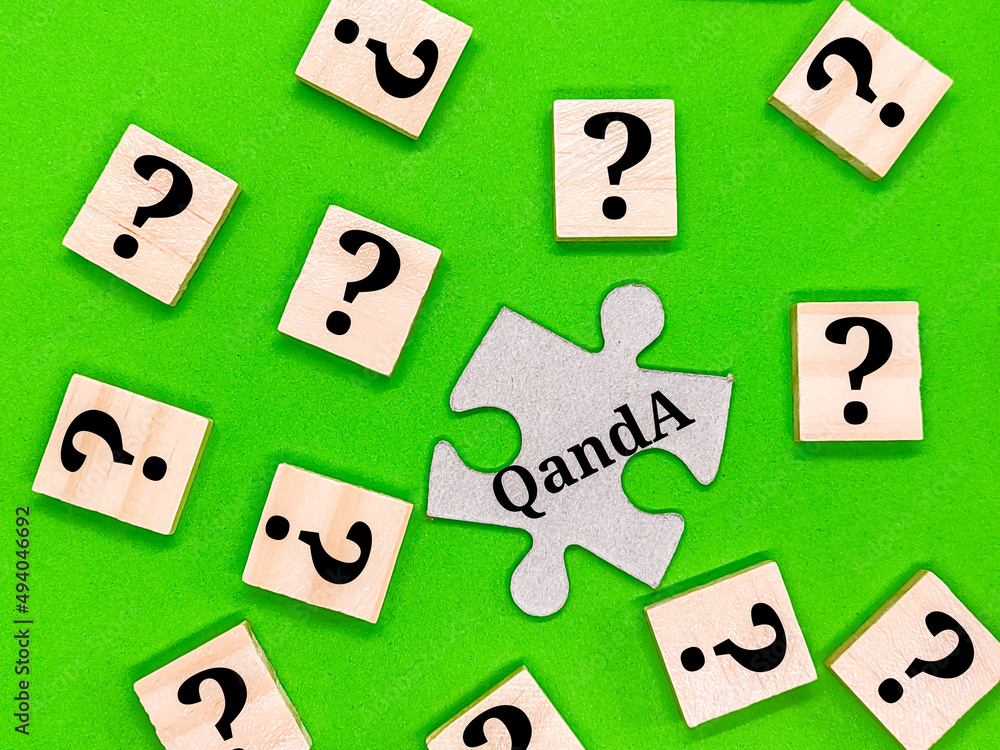 Question mark symbols and puzzles written Question and Answer on a ...