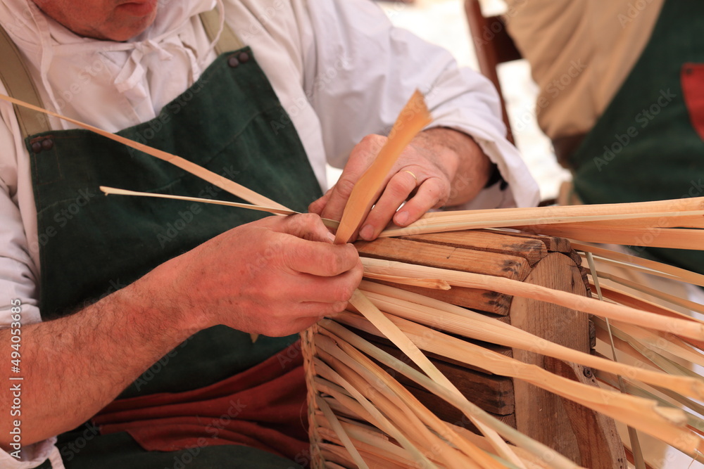 hand weaving of vegetables for chairs or hats Stock Photo | Adobe Stock