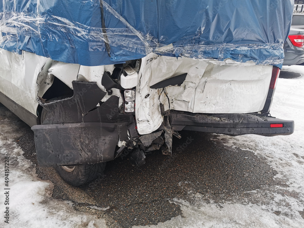 car has dented rear bumper damaged after accident Stock Photo | Adobe Stock