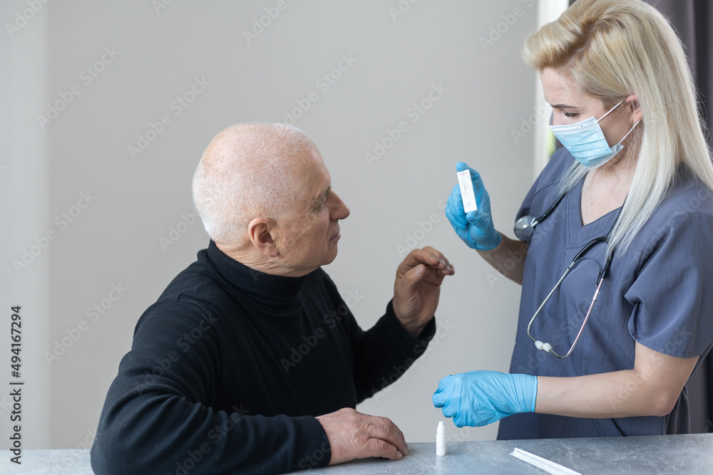 Doctor using nose swab test coronavirus COVID-19 with senior elderly ...