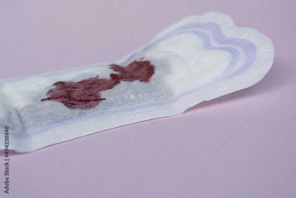 Menstrual blood on a sanitary pad on pink background. Flat lay Stock ...