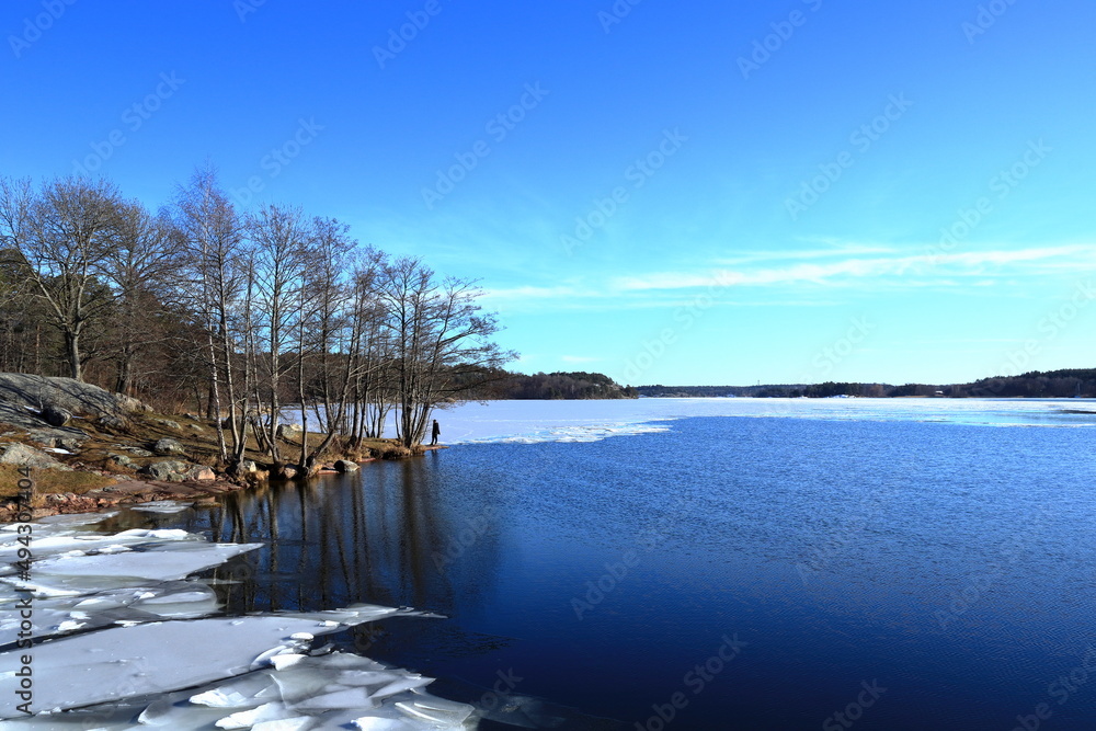 Melting ice at a lake. Close to spring during the month of Mars ...