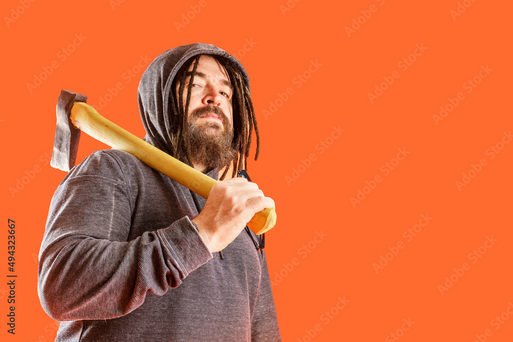 Menacing appearance. A middle-aged man with a beard and an unusual ...