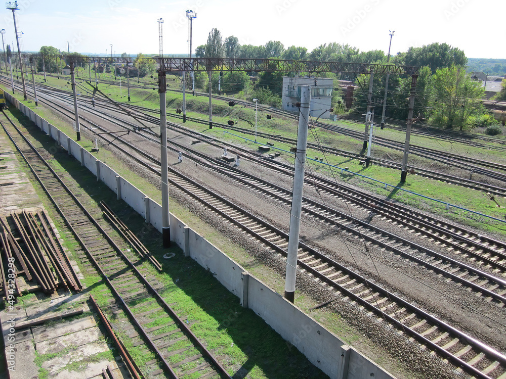 Evenly laid railroad rails crossing the frame diagonally. Railroad ...