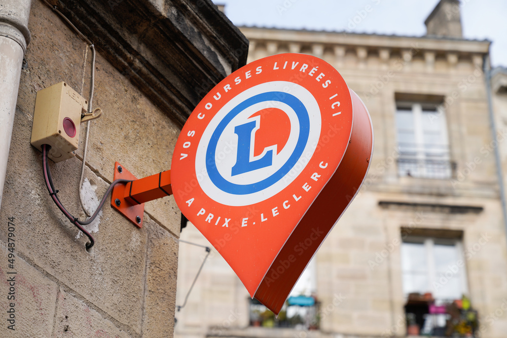 E.leclerc relais text logo and wall brand sign on building facade shop ...