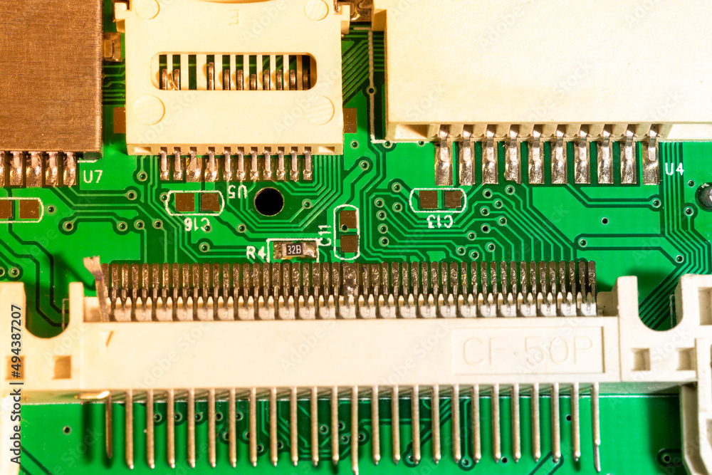 PCB board top view of a CF, micro SD and SD card reader. Macro ...