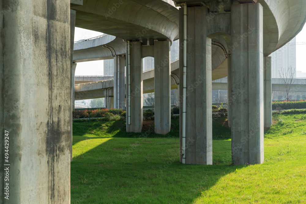 Concrete structure and asphalt road space under the overpass in the ...