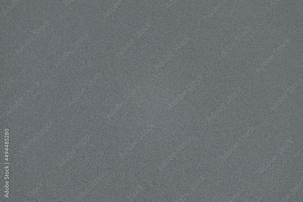Blank, even gray background with fine texture. Neutral backdrop for ads ...