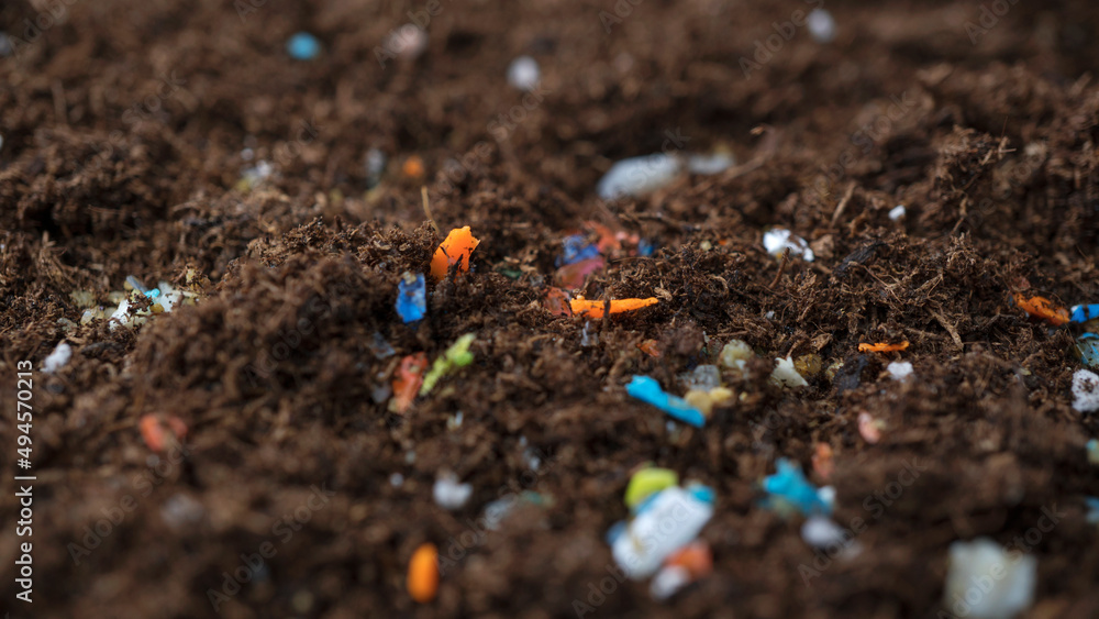 Microplastics inside the soil. Concept of global warming and climate ...