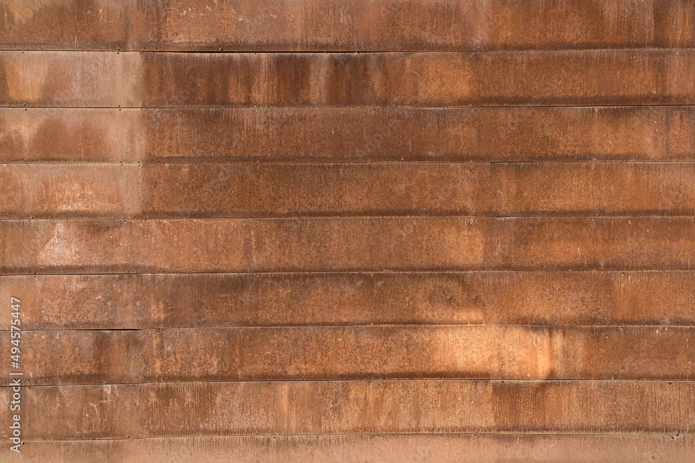 Rusted metal wall texture or old oxidized metal fence background with ...